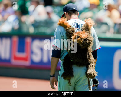 Minnesota Twins pitcher Alex Burnett throws during a spring training ...