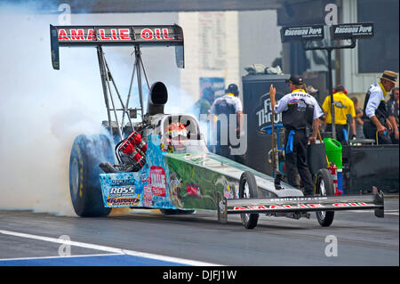 Terry McMillen in the Amalle Oil dragster, has his front wheels lift ...