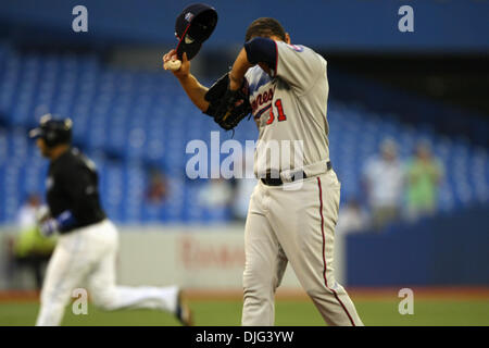 Minnesota Twins pitcher Alex Burnett throws during a spring training ...
