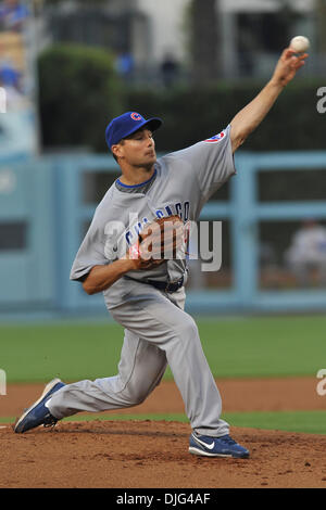 Chicago Cubs' Ted Lilly pitches against the Cincinnati Reds in the ...