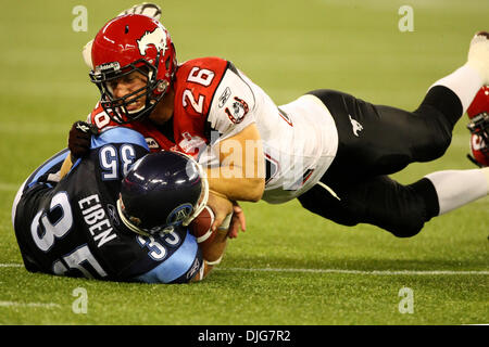 Toronto Argonauts running back Kevin Brown (6) jumps as Ottawa ...