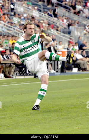 Celtic FC defender Andreas Hinkel (#2) dribbles the ball during the ...