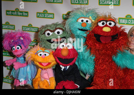 The Muppets Jon Stewart with Elmo and Sesame Street Muppets to host ...