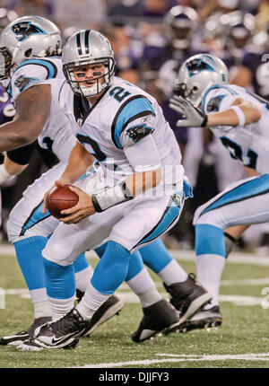 Carolina Panthers rookie quarterback (2) Jimmy Clausen rolls out to ...
