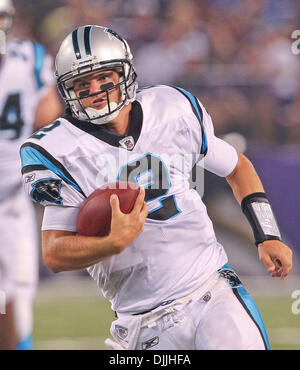 Carolina Panthers rookie quarterback (2) Jimmy Clausen rolls out to ...