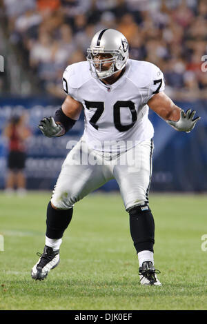 Oakland Raiders offensive tackle Langston Walker rolls over with an ...