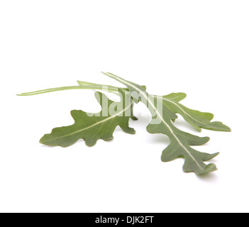 Sweet rucola salad or rocket lettuce leaves isolated on white ...