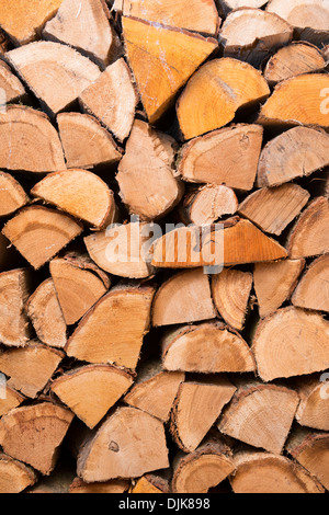 Stack of wooden logs background Stock Photo - Alamy