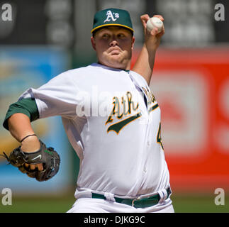 Oakland Athletics pitcher Brett Anderson throws against the Toronto ...
