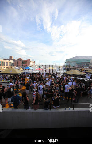 Fans tailgate before an NFL football game between the Los Angeles ...
