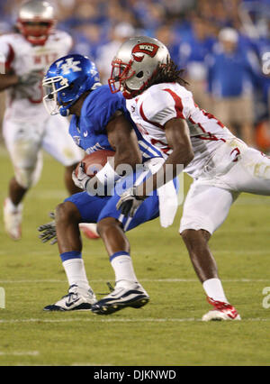 Western Kentucky University defensive back Antwon Kincade, right, helps ...