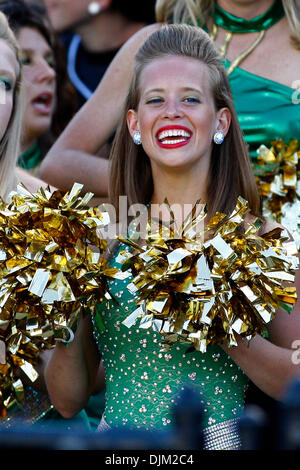 A member of the United States Color Guard makes adjustments to the US ...