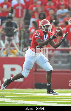 North Carolina wide receiver Jordan Shipp (1) stiff-arms Richmond ...