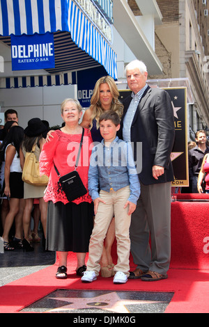 Radio personality Ellen K with her son Calvin Laughlin and husband Roy ...