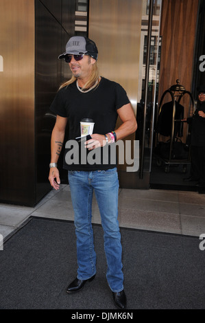 Poison frontman Brett Micheals poses for photographers in front of his ...