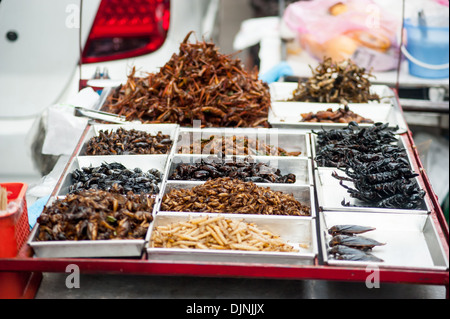 Deep fried bugs on offer in a street market in Bangkok, Thailand ...