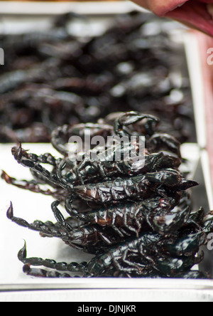 Deep fried bugs on offer in a street market in Bangkok, Thailand ...