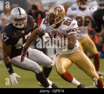 San Francisco 49ers' Allen Rossum runs back the game-opening kickoff ...