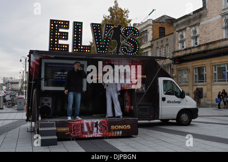 Elvis impersonator and street karaoke in Cardiff city centre Stock ...