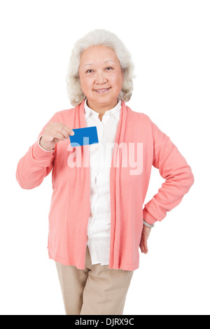 Senior woman holding name card Stock Photo - Alamy