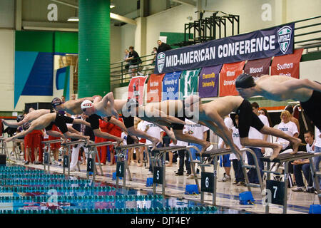 Swimmers wait for the start of 500 Yard Freestyle event during meet ...