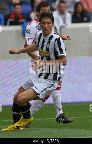 Juventus forward Alessandro Del Piero, right, controls the ball from ...
