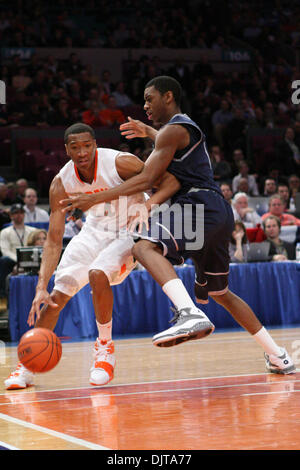 Syracuse guard Andy Rautins (1) drives around Louisville guard Preston ...