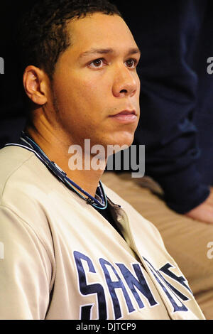 San Diego Padres' Kyle Blanks reacts to being hit by a pitch from Texas ...