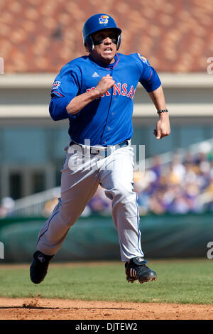 12 March 2010: Kansas at LSU, LSU first baseman Blake Dean (34) circles ...
