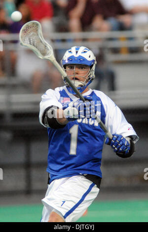 1 May 20010: Hobart junior mid-fielder Tim Bigelow (15) gets past the ...