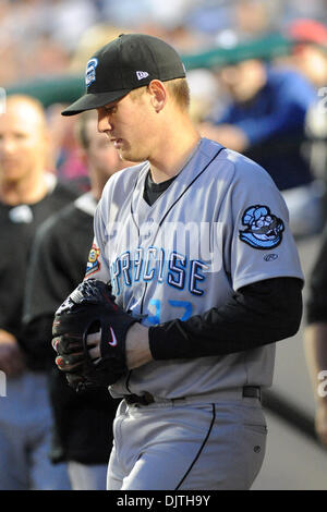 Syracuse Chiefs starting pitcher Stephen Strasburg watches a delivery ...