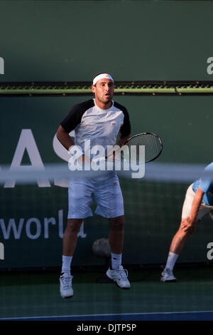 Marcos Baghdatis (CYP) returns a shot against Tommy Robredo (ESP) at ...
