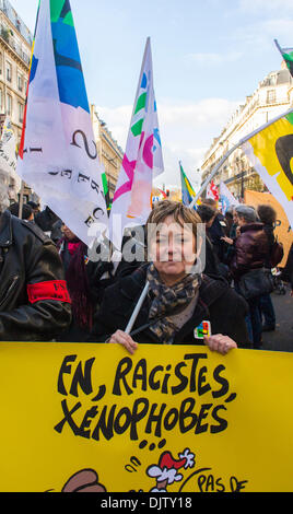Protesters demonstrating different anti racism slogans on white ...