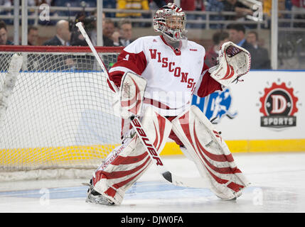 Wisconsin Goaltender Scott Gudmandson (#1) in game action between the ...