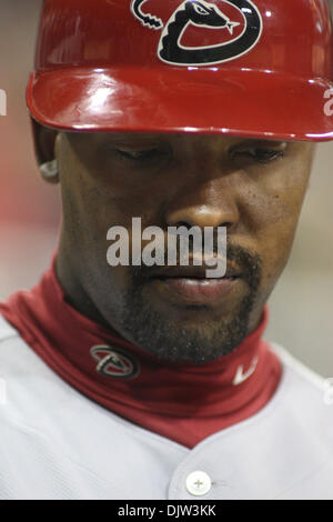 Arizona Diamondbacks third base coach coach Shaun Larkin (88) and first ...
