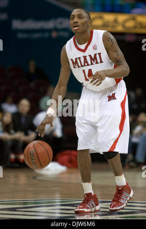 11 March 2010: Miami (OH) RedHawks Kenny Hayes (14) is defended by ...