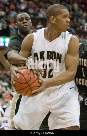 12 March 2010: Akron Zips Brett McKnight (23) with a slam dunk during ...