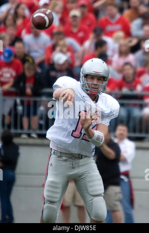 Ohio State Buckeyes quarterback Justin Fields (1) is upended during the ...