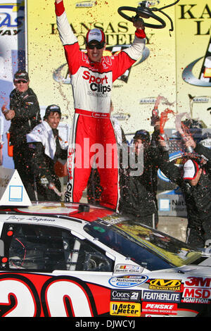 Joey Logano celebrates in victory lane after winning a NASCAR Cup ...