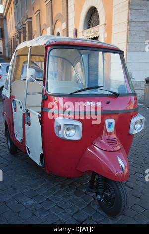 Three-wheeled scooter Ape by Piaggio in a street in Matera, Basilicata ...