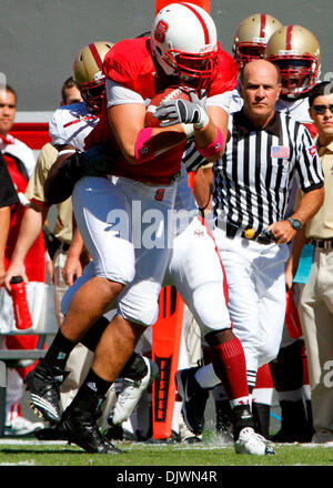 North Carolina State's George Bryan (84) pulls in a one-handed ...
