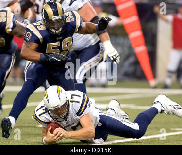 St. Louis Rams linebacker Larry Grant (59) battles Tampa Bay Buccaneers ...
