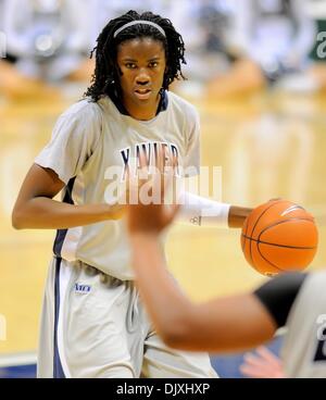Xavier forward Amber Harris (11) puts up a shot against Dayton center ...