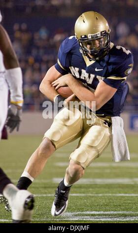 Navy quarterback Kriss Proctor (2) on a quarterback keeper. Navy ...