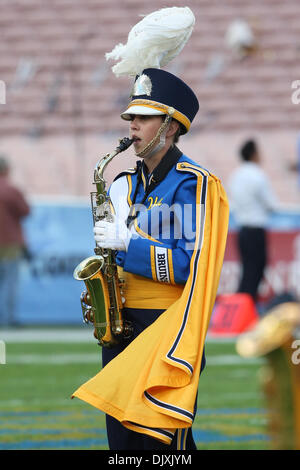 Member of the UCLA Bruins marching band performs before a football game ...