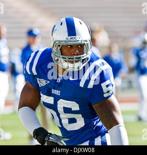 Duke linebacker Damian Thornton (56) and defensive end Wesley Oglesby ...