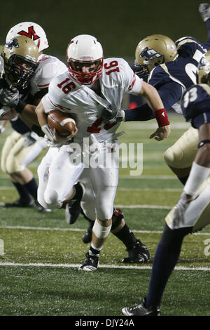 Miami (Ohio) quarterback Austin Boucher (16) is chased down by Illinois ...