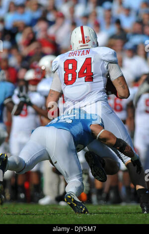 North Carolina State's George Bryan (84) pulls in a one-handed ...