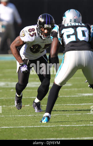 Baltimore Ravens wide receiver Derrick Mason (85) spins away from ...