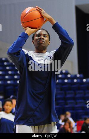 Xavier forward Amber Harris (11) puts up a shot against Dayton center ...